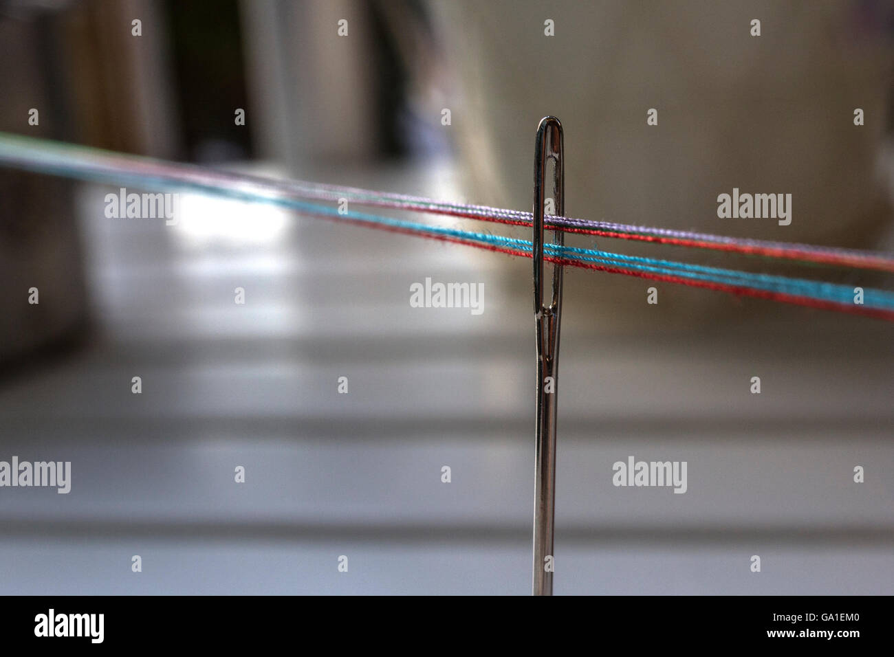 needle and thread Stock Photo - Alamy