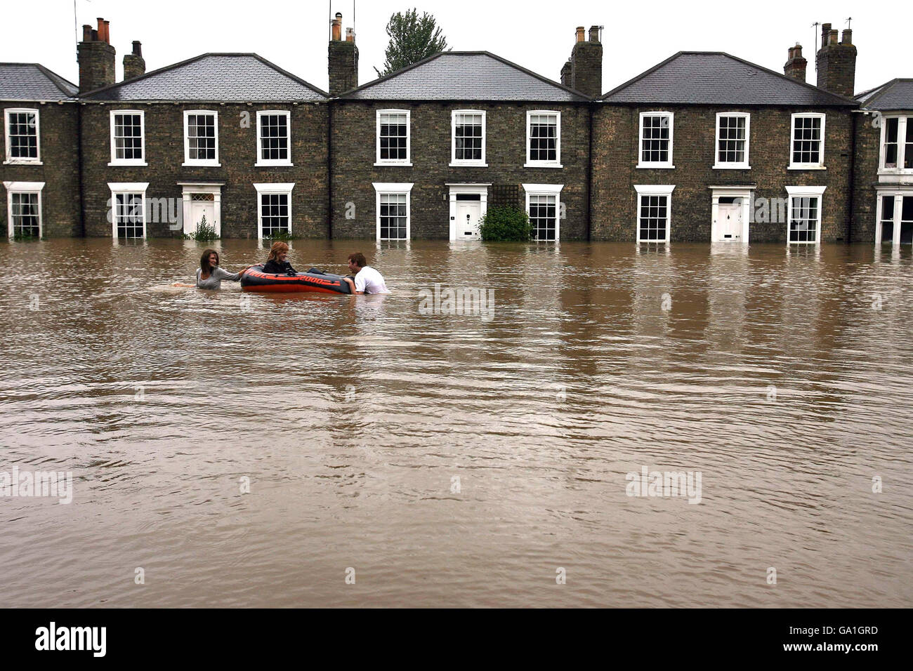 Residents wade through hi-res stock photography and images - Alamy