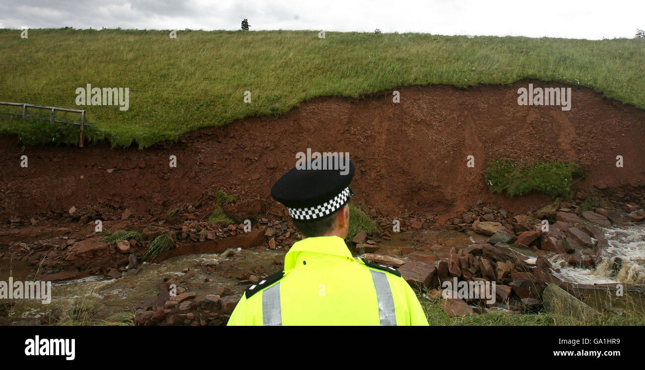 Which engineers fear could breach following heavy rainfall hi-res stock ...