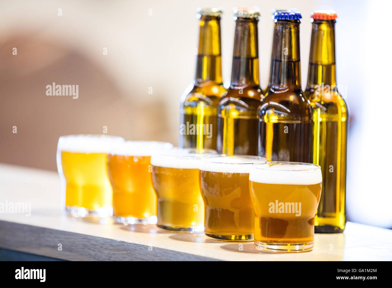 Bottles of beer on a bar hi-res stock photography and images - Alamy