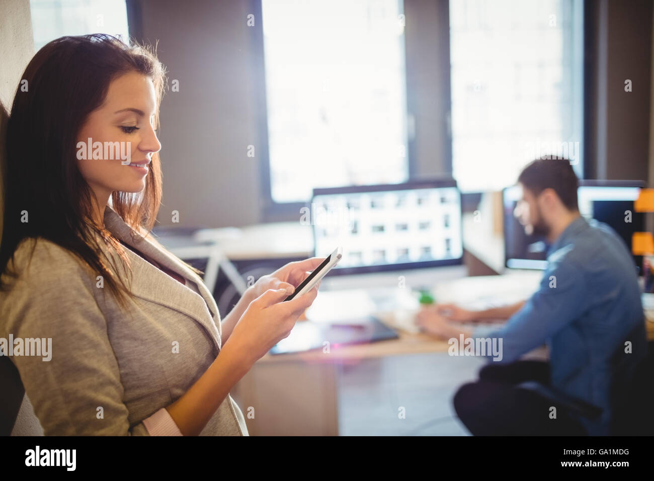 Smiling graphic designer using hi-res stock photography and images - Alamy