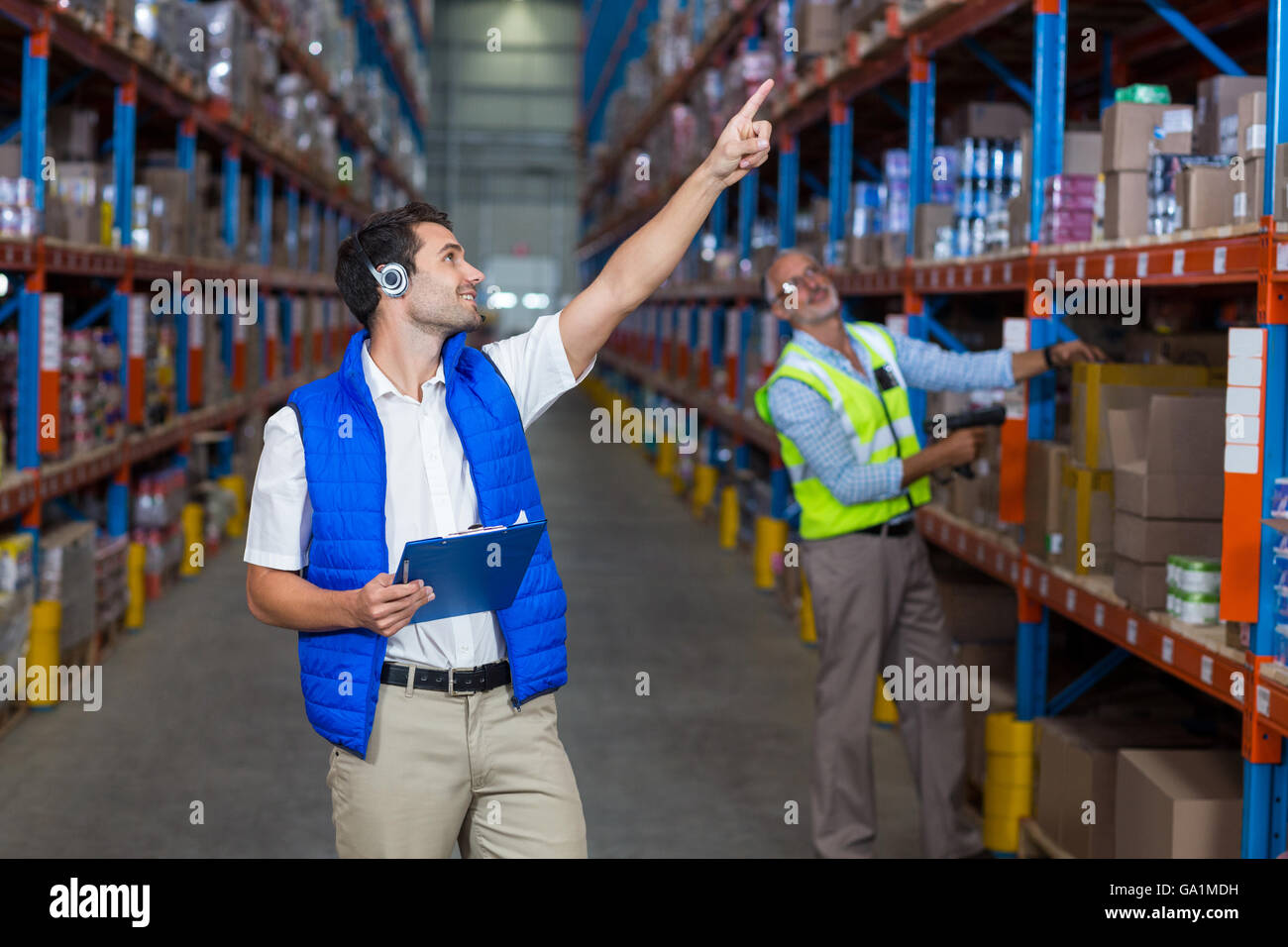 Workers colleague looking up Stock Photo - Alamy