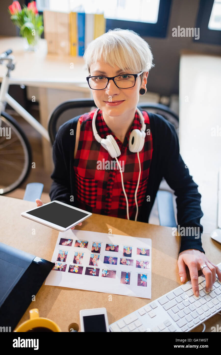 Graphic designer working on computer Stock Photo - Alamy