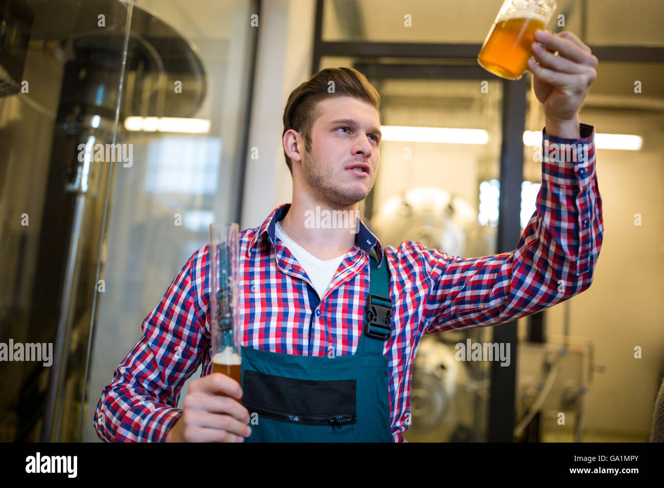 Brewer testing beer Stock Photo - Alamy