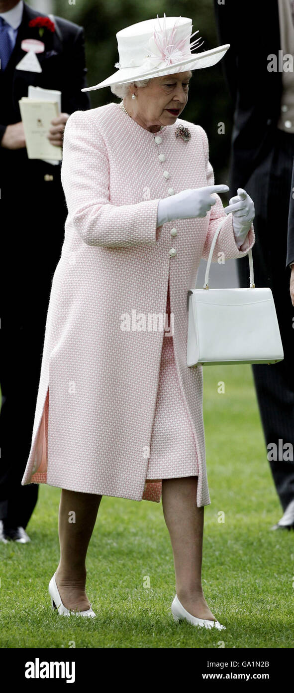 Britain's Queen Elizabeth II arrives at the winners enclosure on day ...