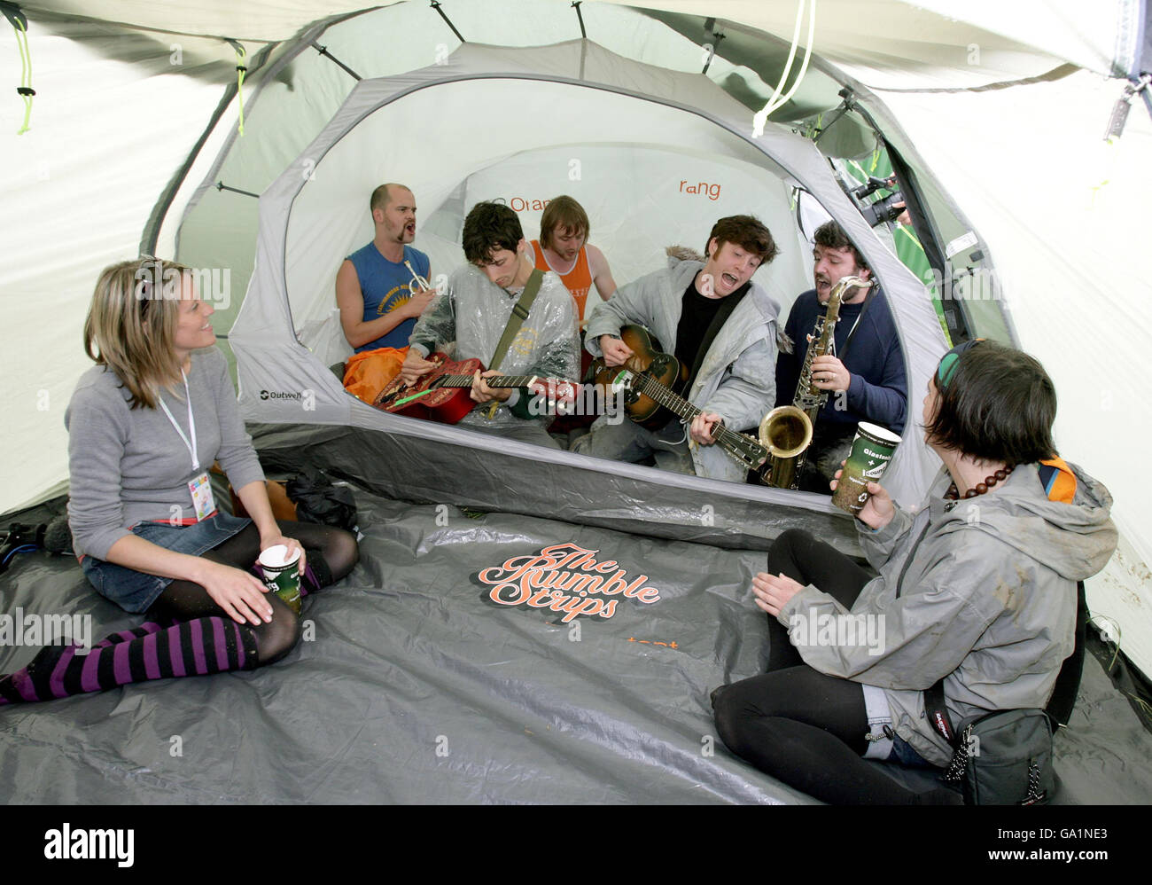 Emma Simkins and Isabelle Broom listen as The Rumblestrips play ...