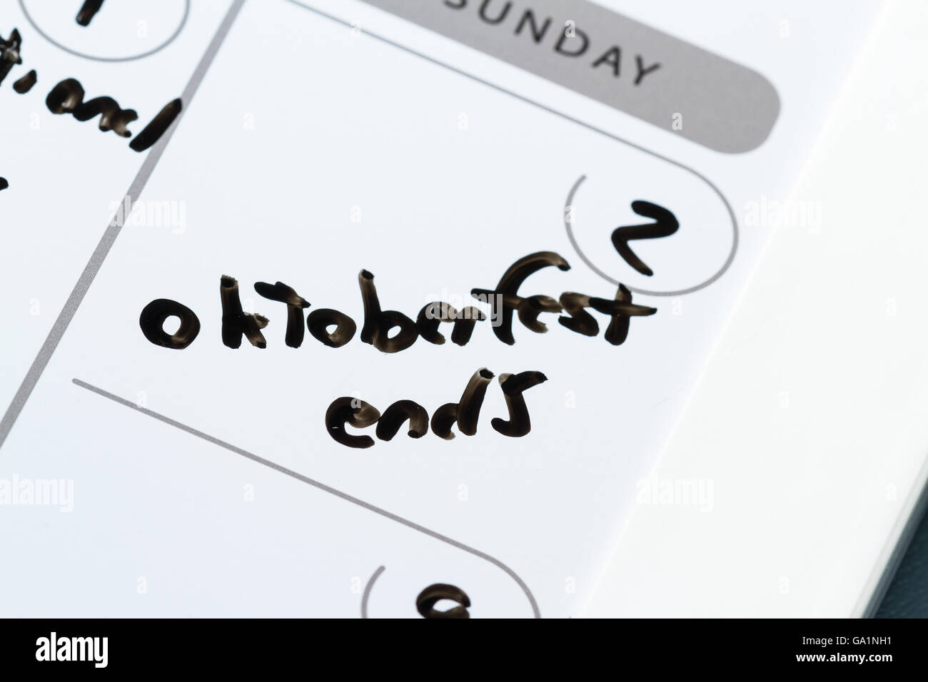 close up of a daily planner or calendar with a hand written message for ...