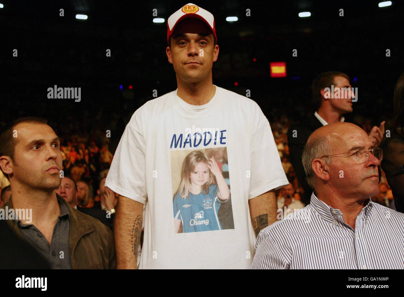 Robbie Williams wears a Maddie t-shirt while watching England's Ricky ...