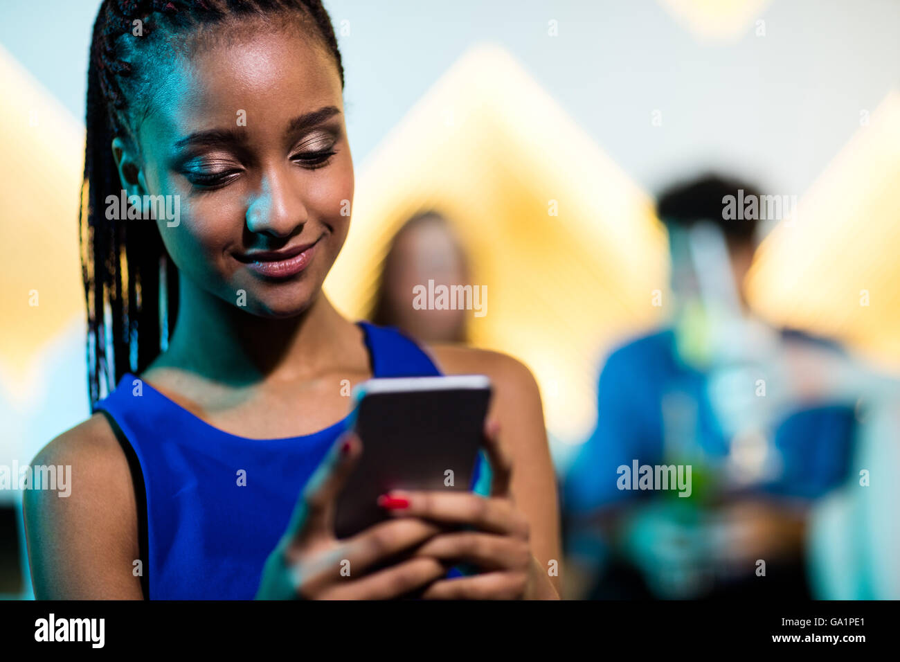 Beautiful woman using mobile phone Stock Photo - Alamy
