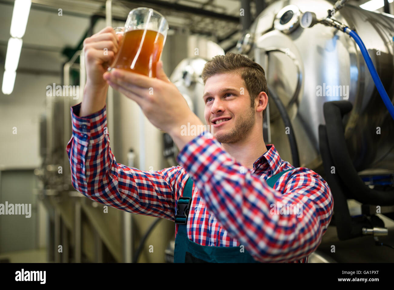 Brewer testing beer Stock Photo - Alamy