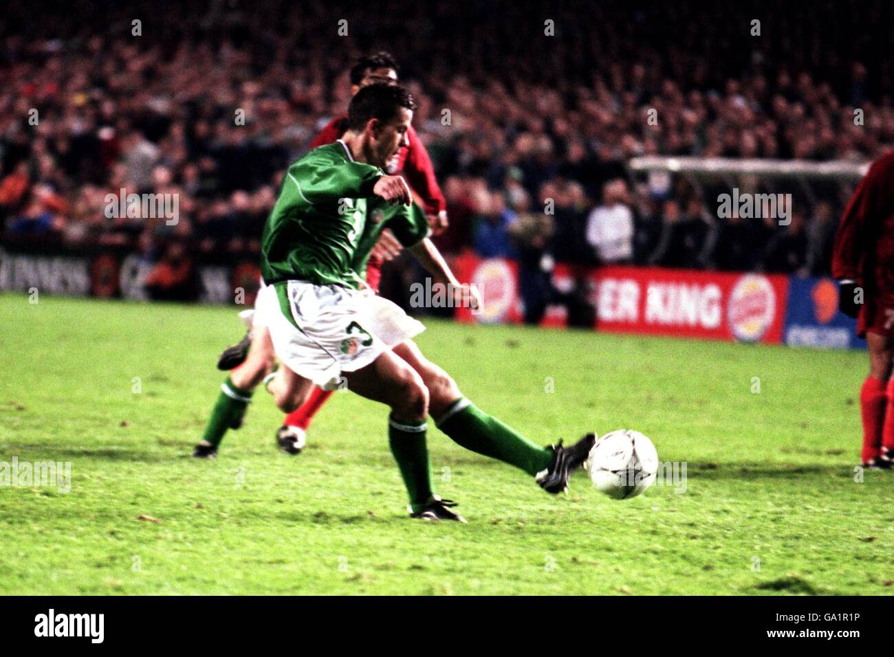 Ireland's Ian Harte scores the opening goal from the penalty spot ...