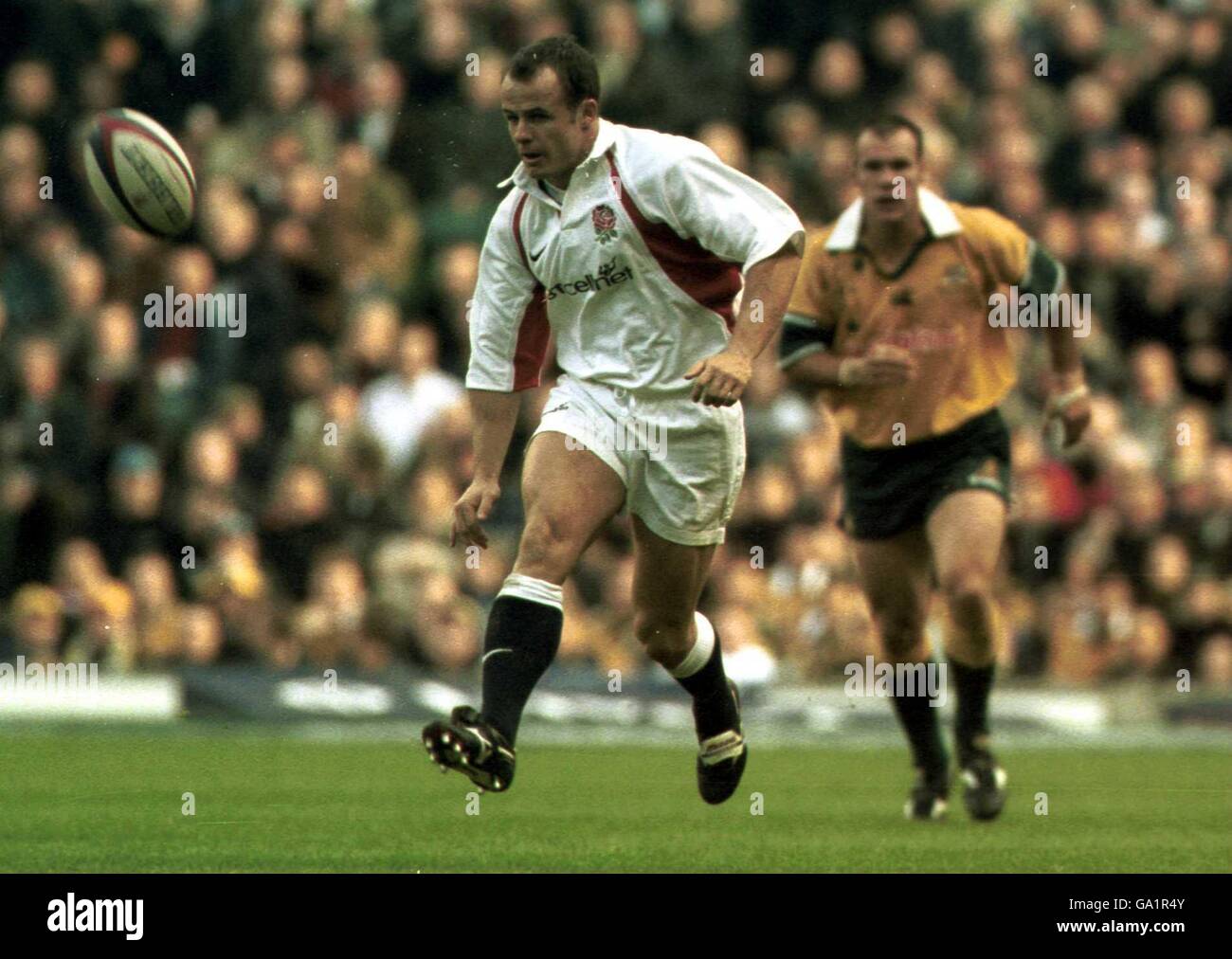 Englands austin healey kicks ahead against australia hi-res stock ...