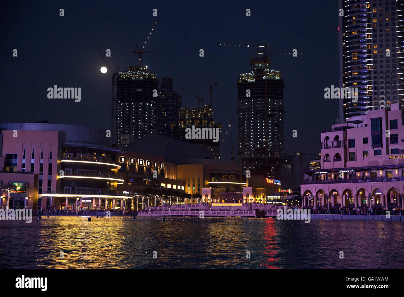 Fullmoon and city lights in downtown Dubai Stock Photo - Alamy
