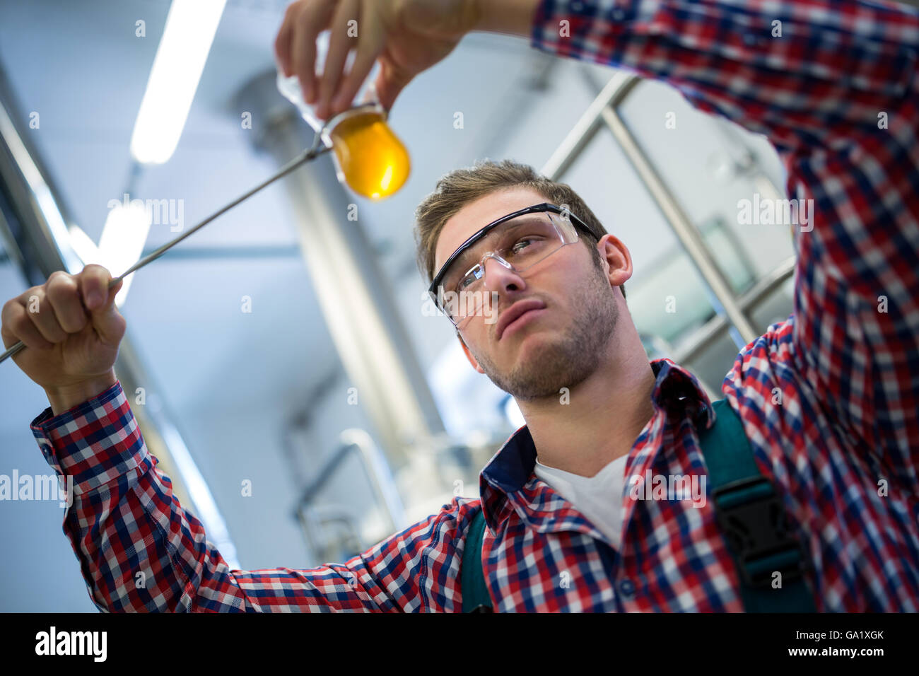 Brewer testing beer Stock Photo - Alamy