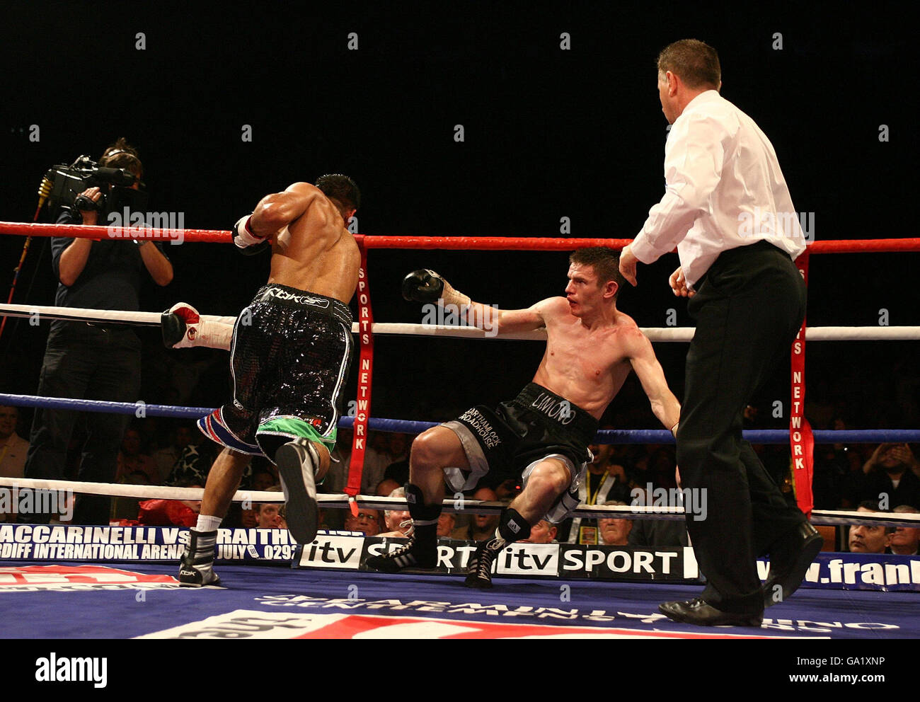 England's Amir Khan and Scotland's Willie Limond in action during the ...