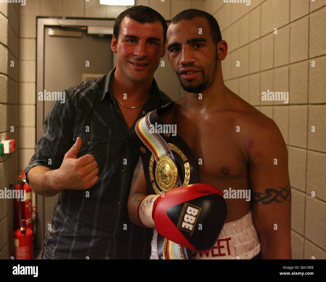 Wales' Bradley Pryce with Joe Calzaghe after victory in the ...