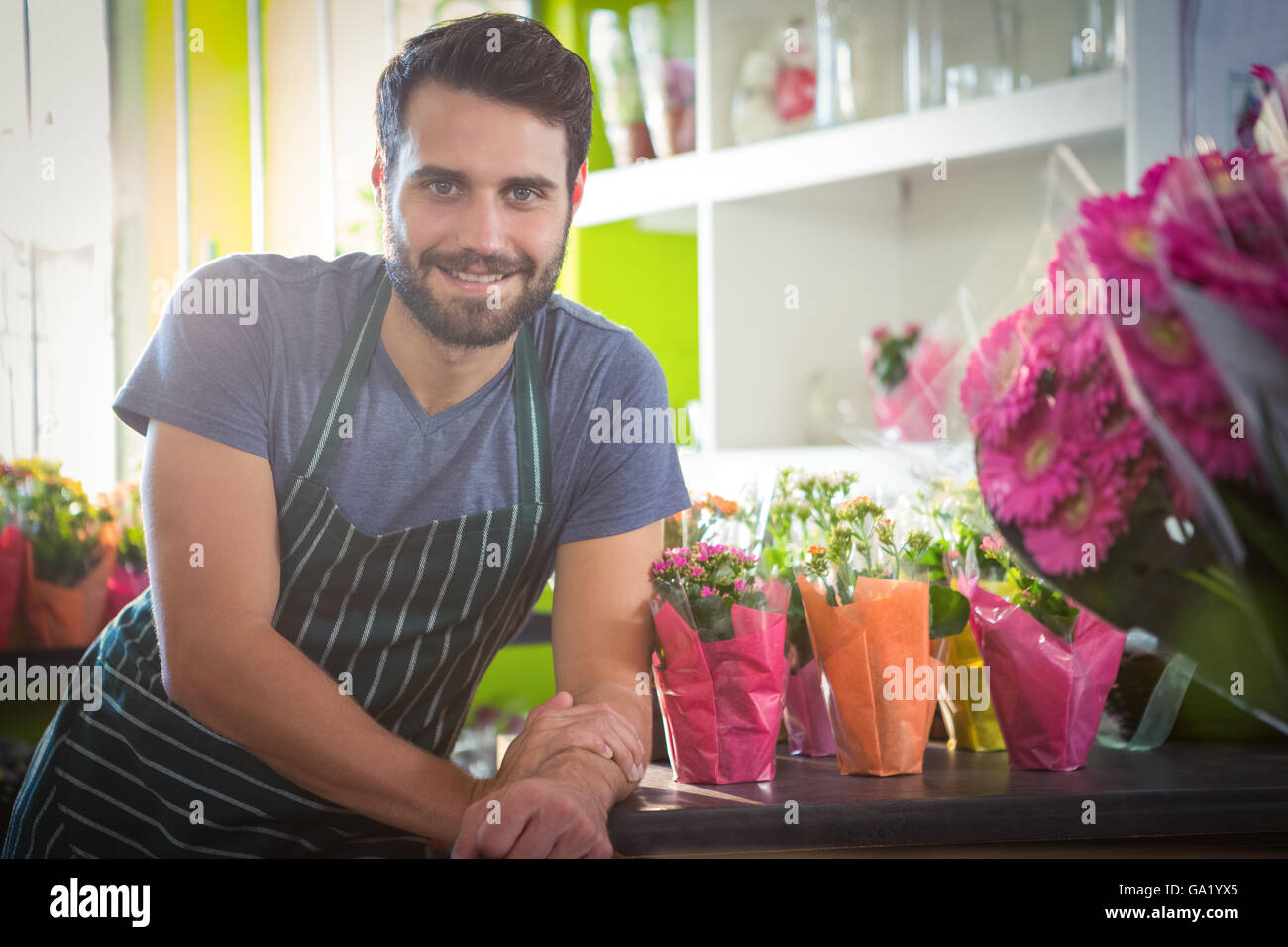 Male florist at his flower shop Stock Photo - Alamy
