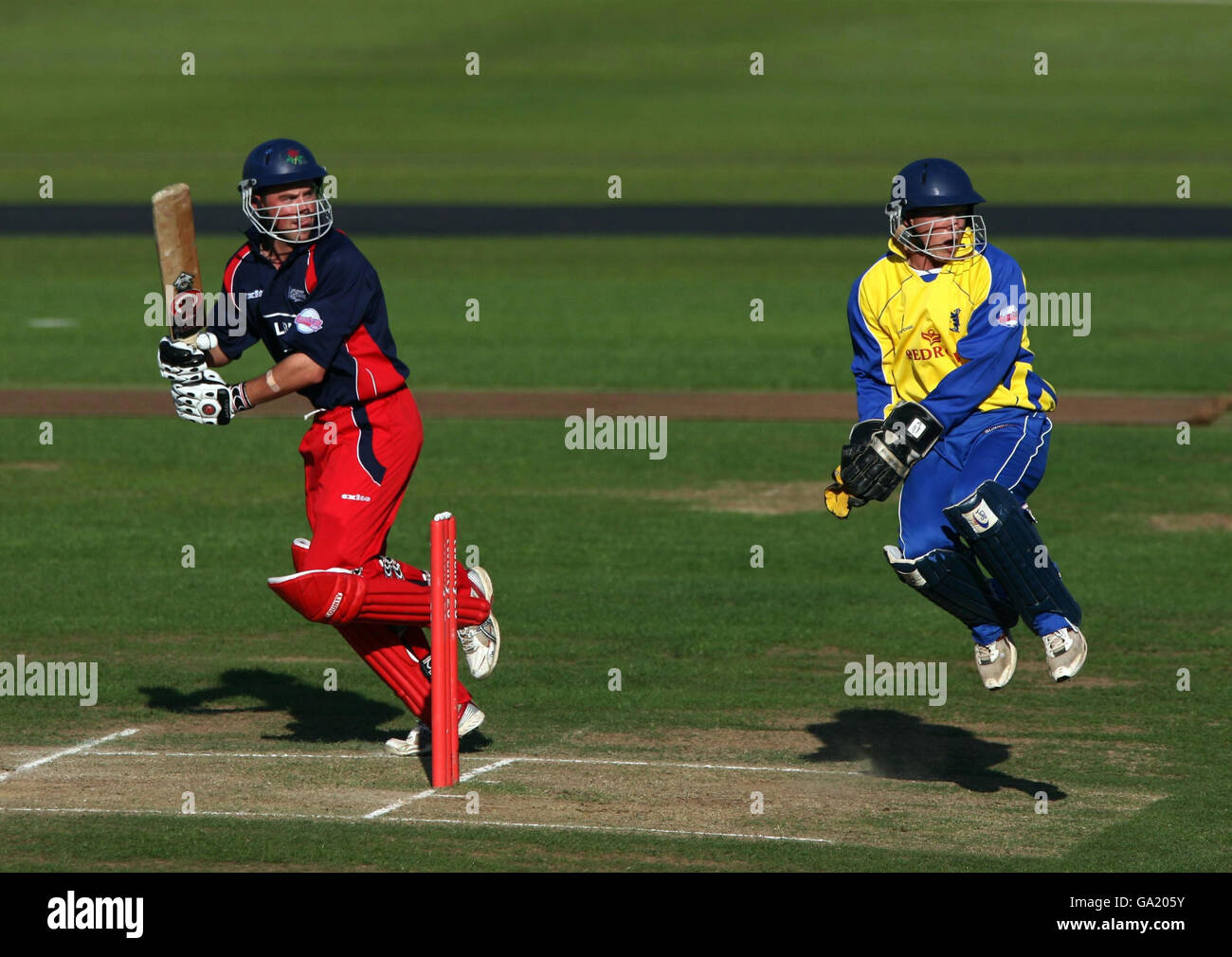 Sport cricket jumping batting hi-res stock photography and images - Alamy