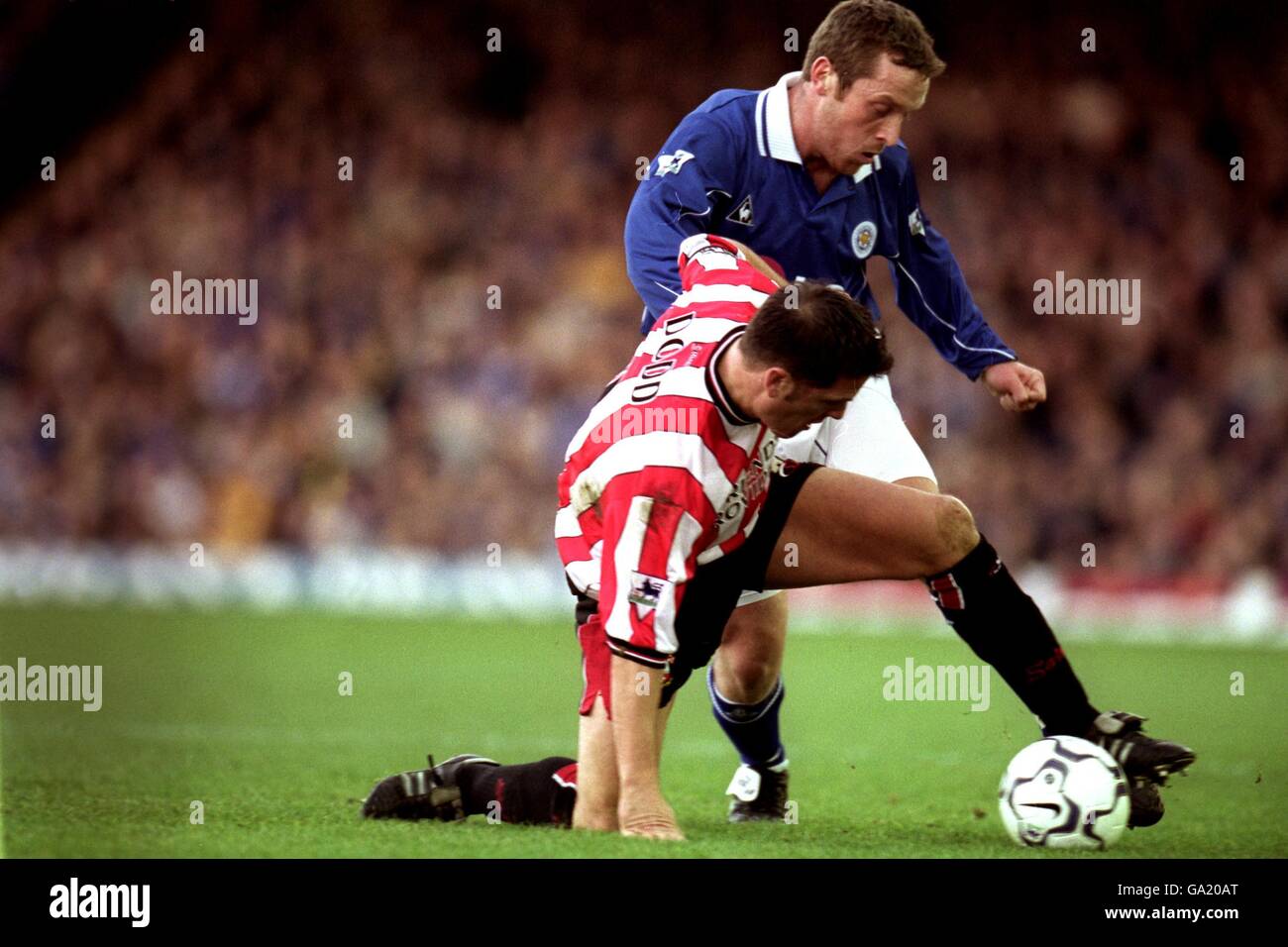 Southampton's Jason Dodd battles with Leicester's Alan Rogers Stock ...