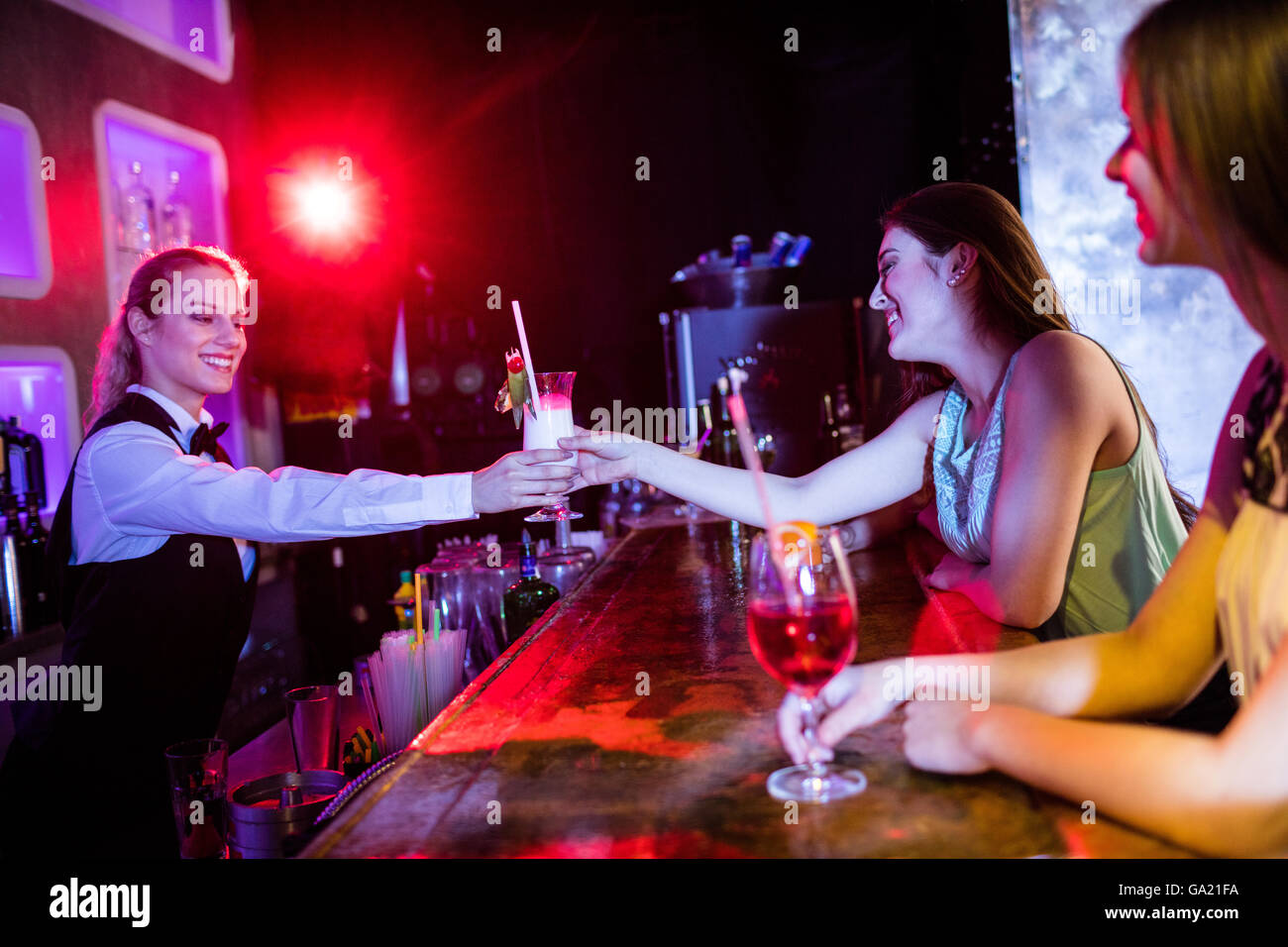 Cocktail waitress hi-res stock photography and images - Alamy