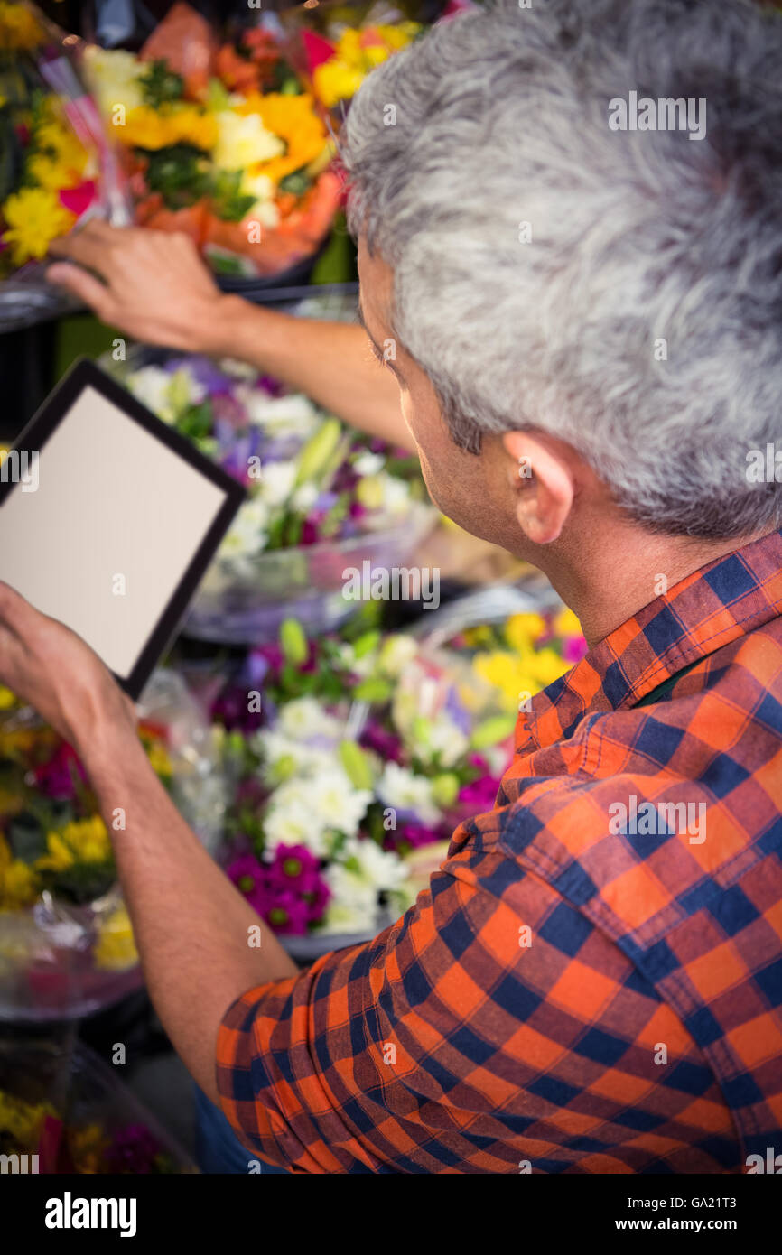 Male florist tablet flower hi-res stock photography and images - Alamy