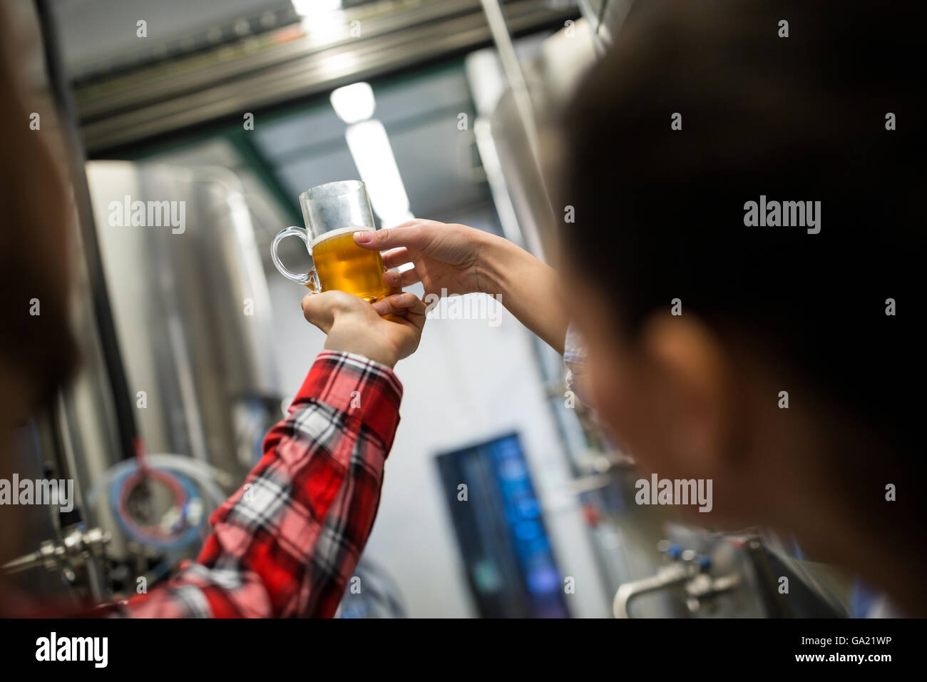 Brewers testing beer Stock Photo - Alamy