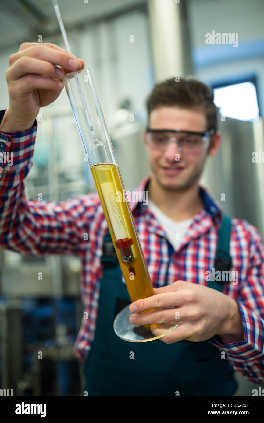 Brewer testing beer Stock Photo - Alamy