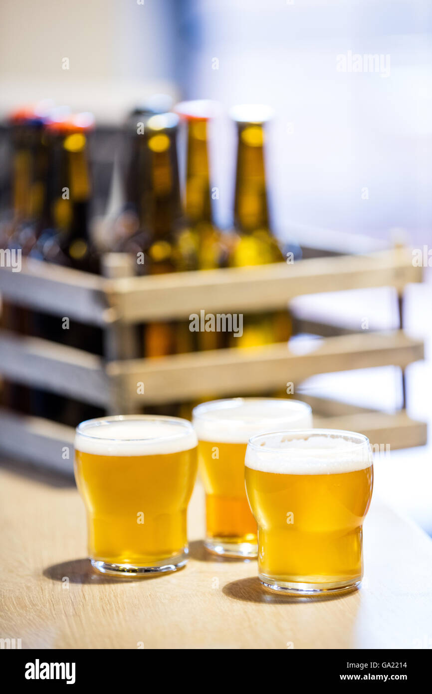 Beer glasses on the bar counter Stock Photo - Alamy