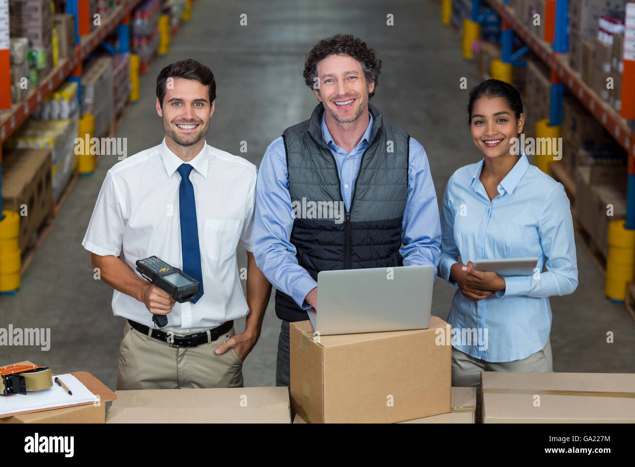 Happy managers are posing during work Stock Photo - Alamy
