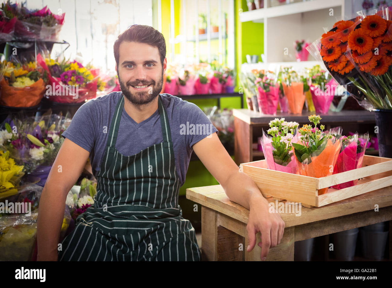 Male florist at his flower shop Stock Photo - Alamy
