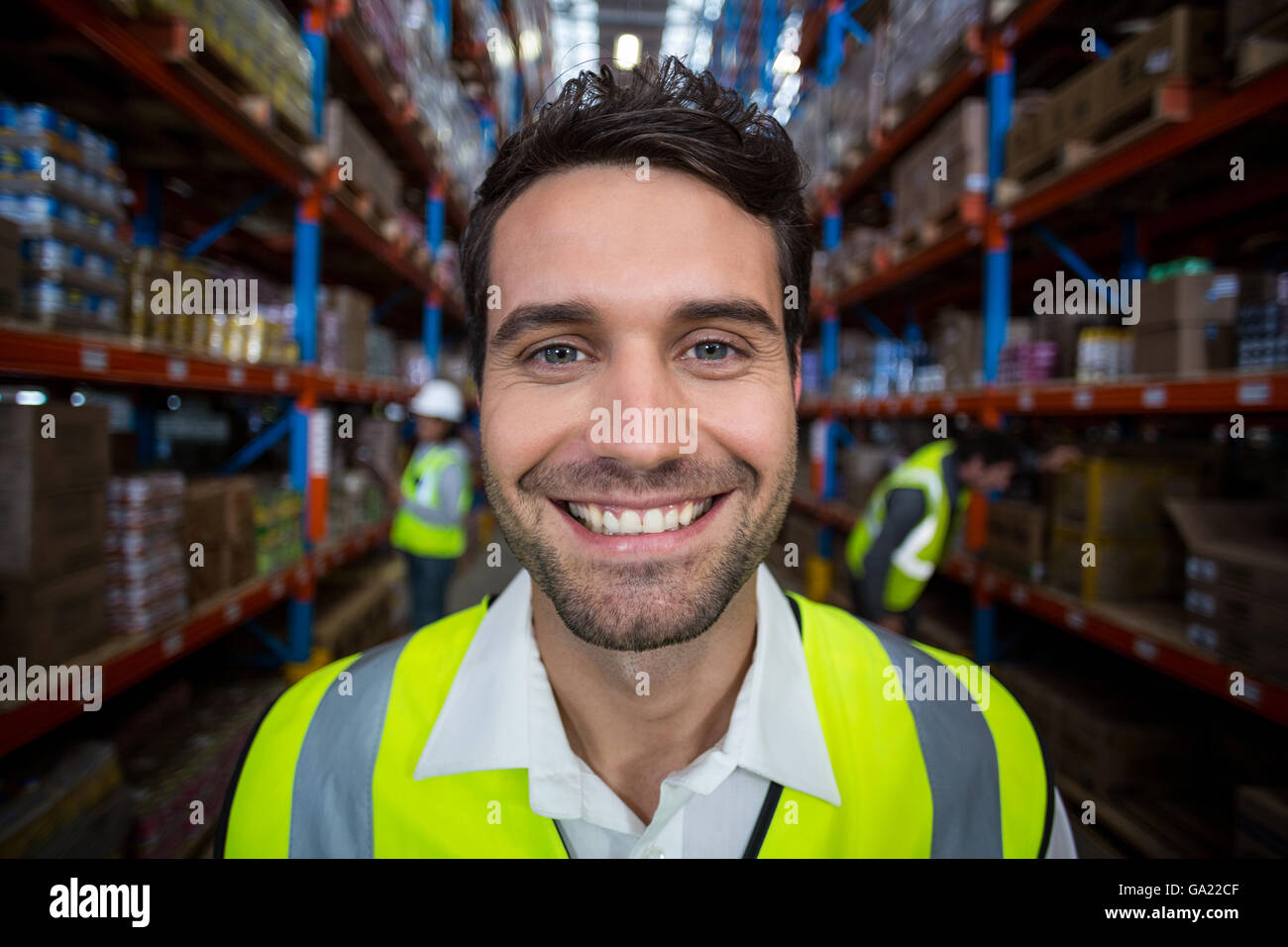 Standing safety helmet smiling communication transportation hi-res ...