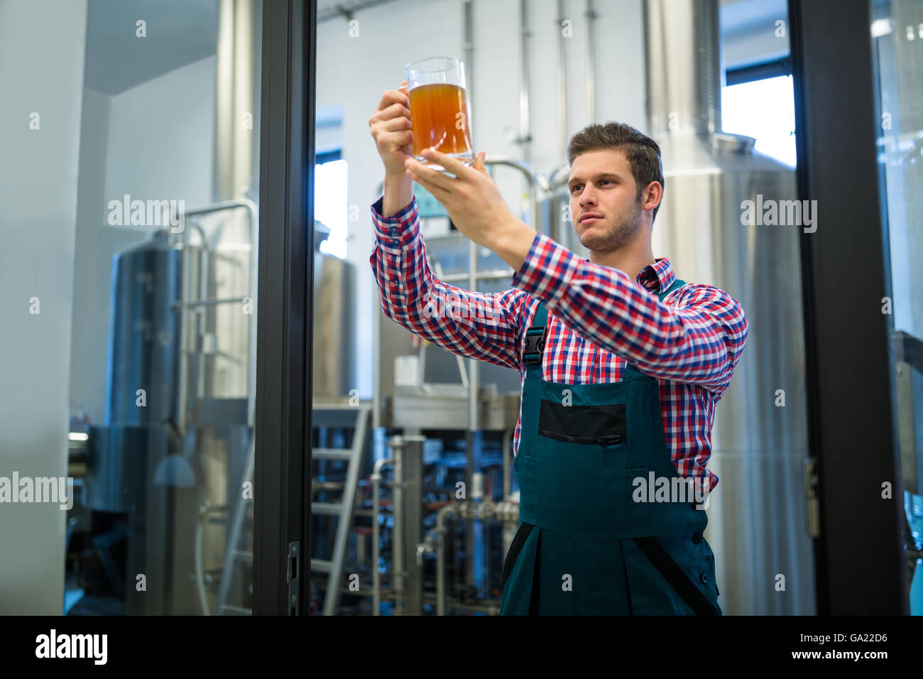 Brewer testing beer Stock Photo - Alamy