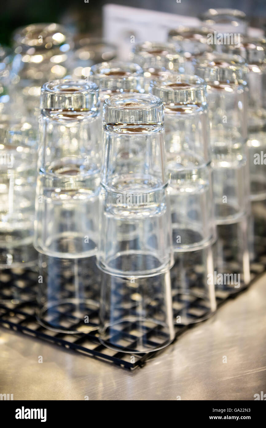 Stacked glass at bar Stock Photo - Alamy