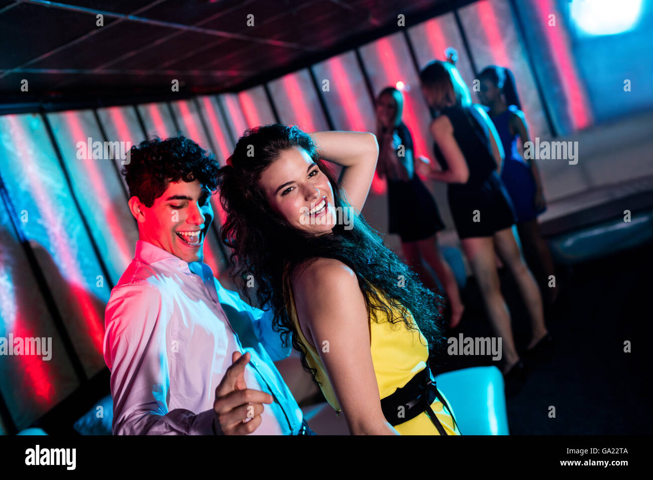 Cute couple dancing together on dance floor Stock Photo - Alamy