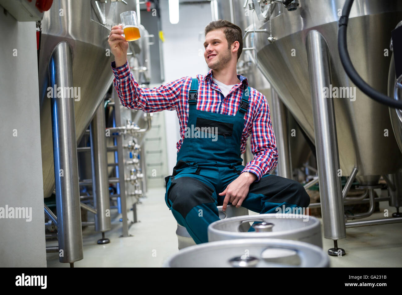 Brewer testing beer Stock Photo - Alamy
