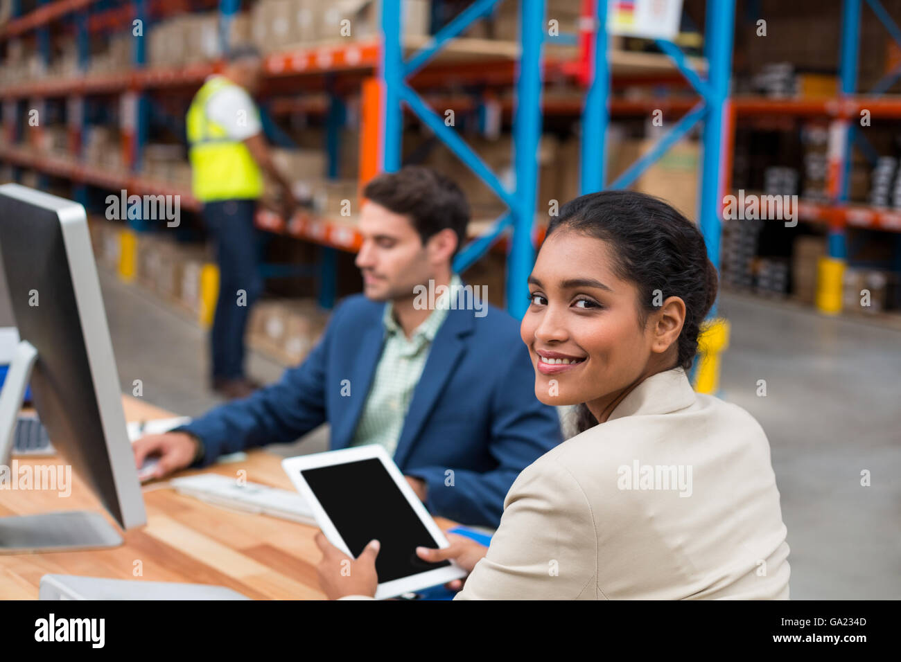 Working at a desk hi-res stock photography and images - Alamy