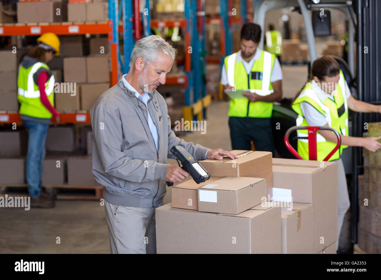 Focus on workers and manager are working Stock Photo - Alamy