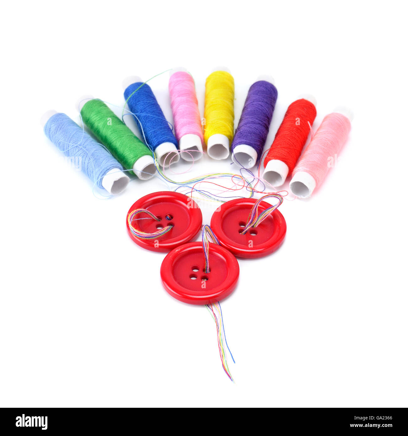 Red buttons and thread spools isolated on white background Stock Photo ...