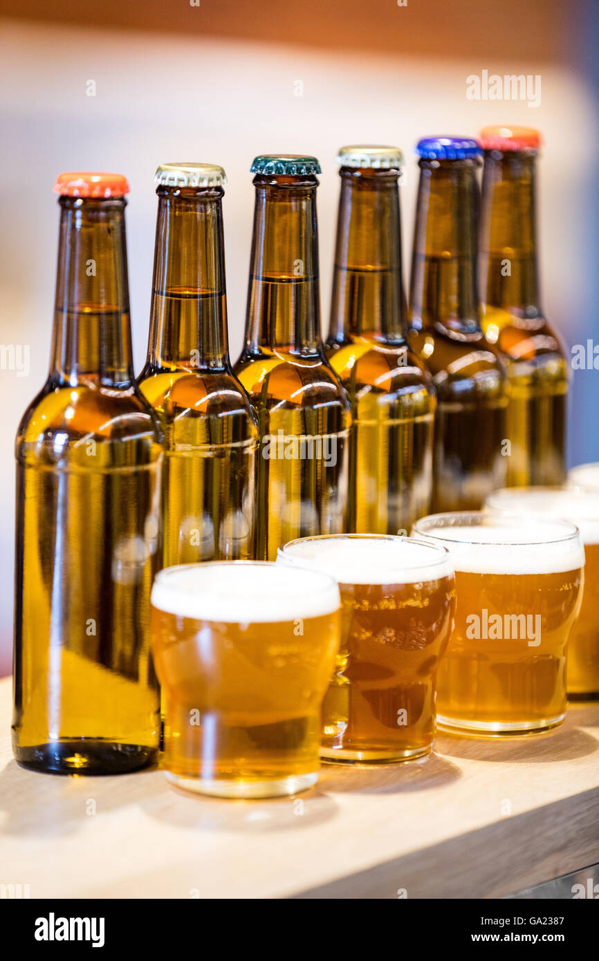 Bottles of beer on a bar hi-res stock photography and images - Alamy