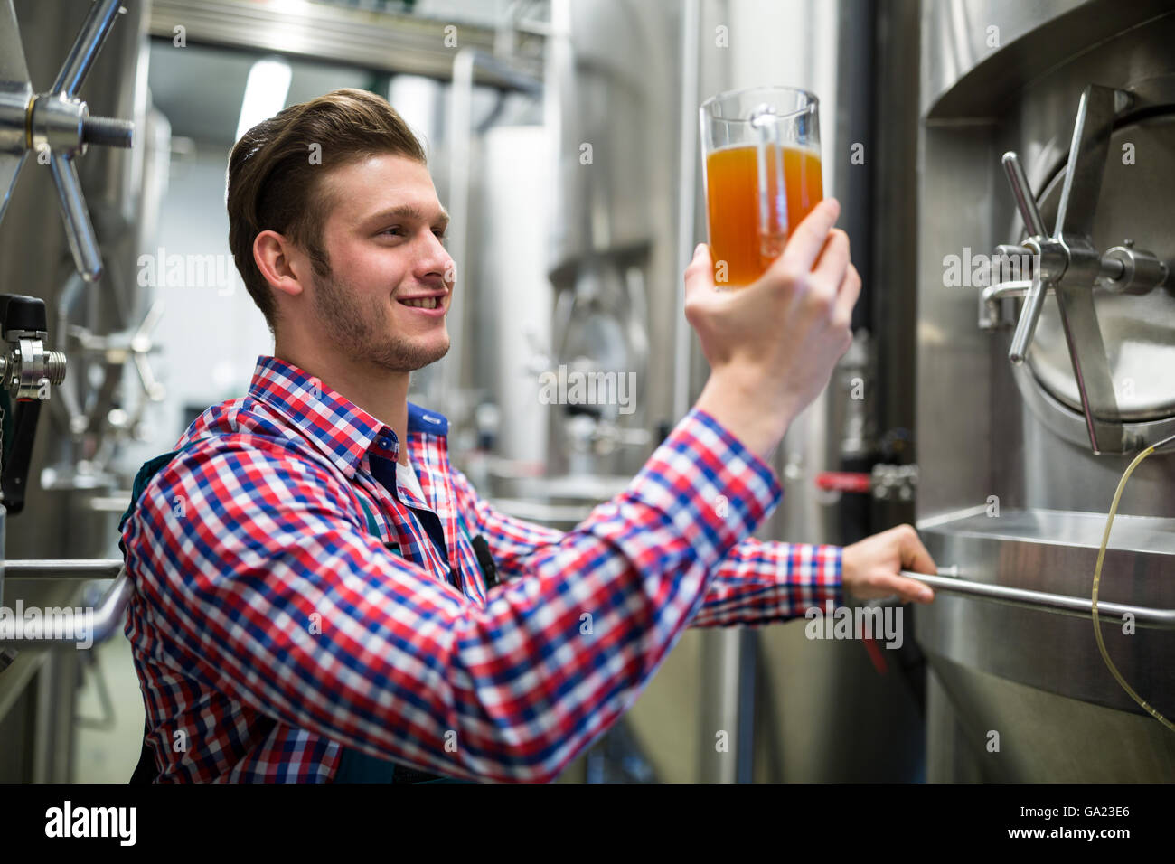Brewer testing beer Stock Photo - Alamy