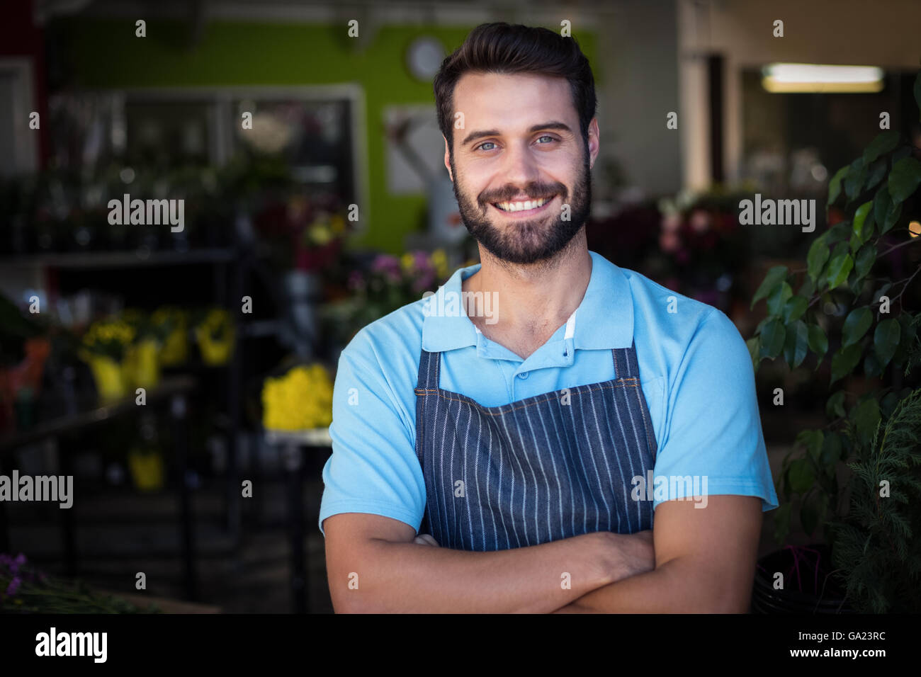 Portrait of male florist smiling Stock Photo - Alamy