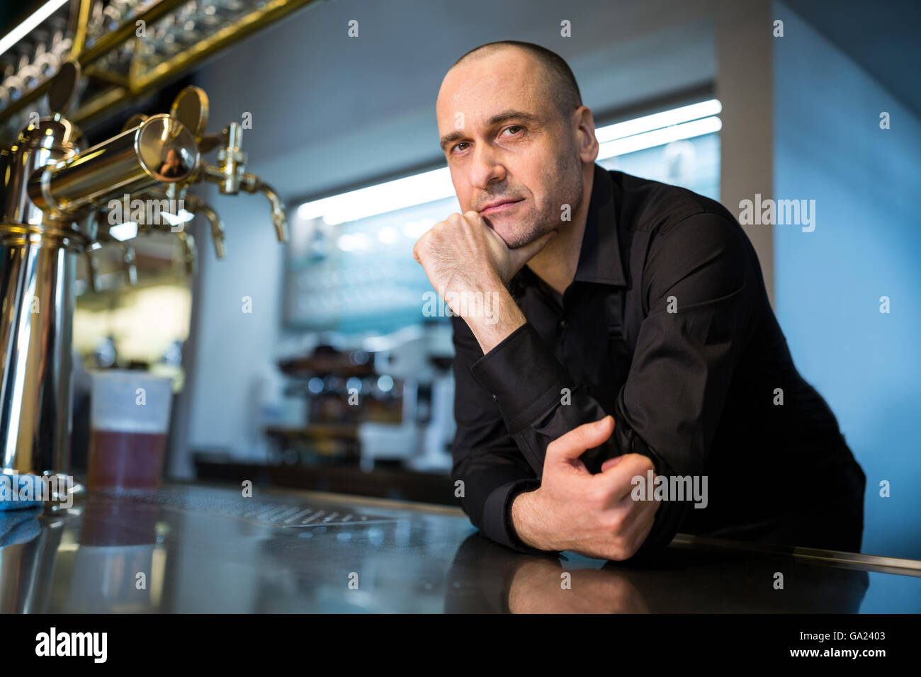 Leaning bar hi-res stock photography and images - Alamy