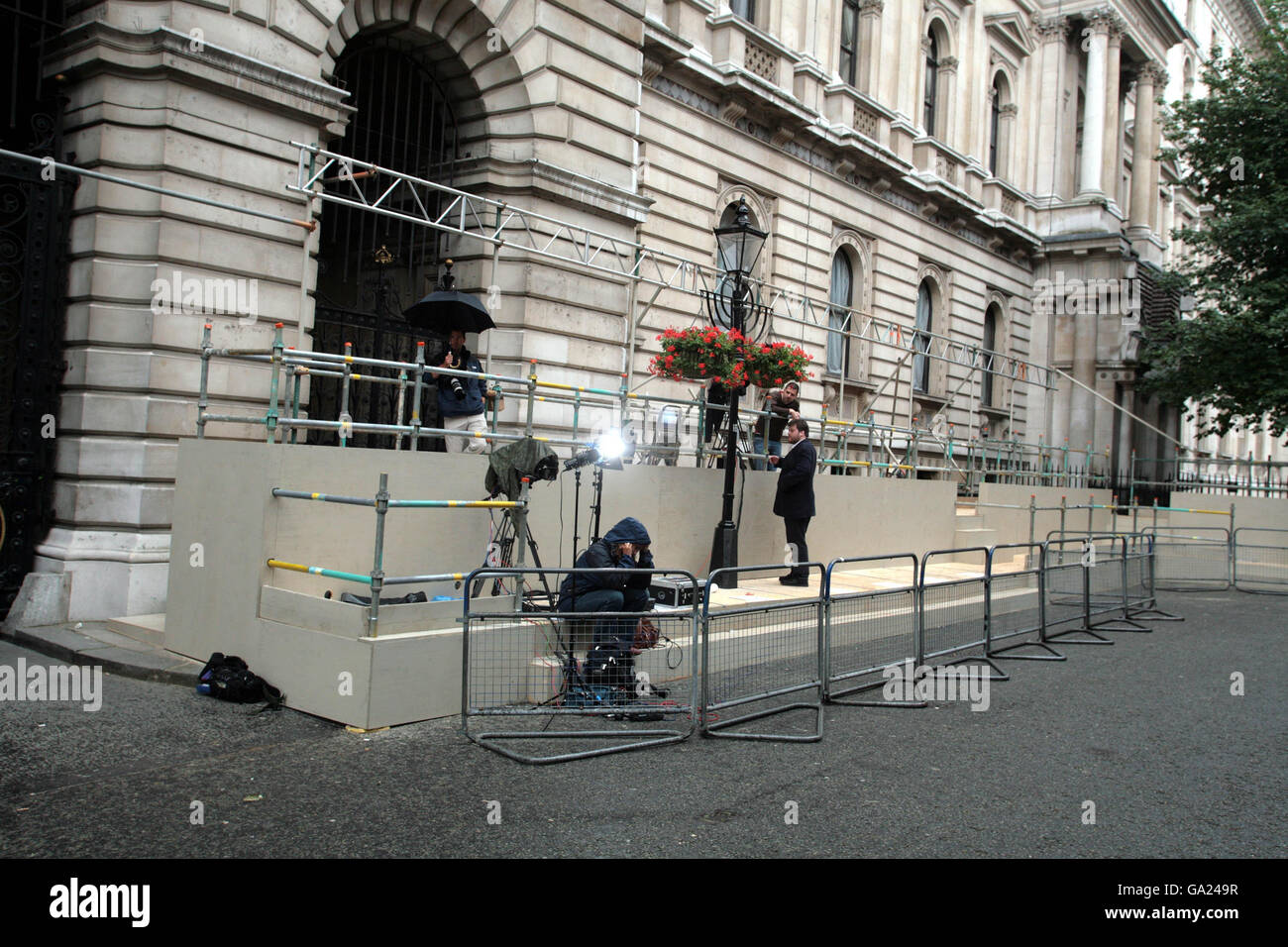 Platforms have been erected in Downing street for the handover of power ...