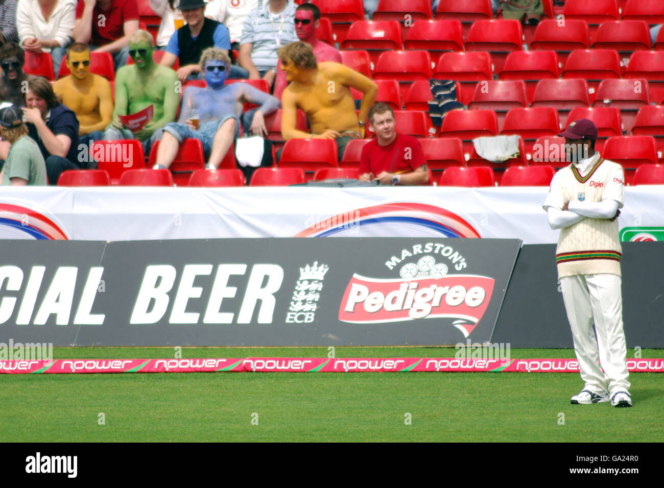 West Indies' Corey Collymore in a fielding position as a group of ...