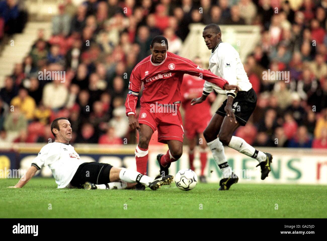 Middlesbrough's Paul Ince evades the challenge from Derby's Craig ...