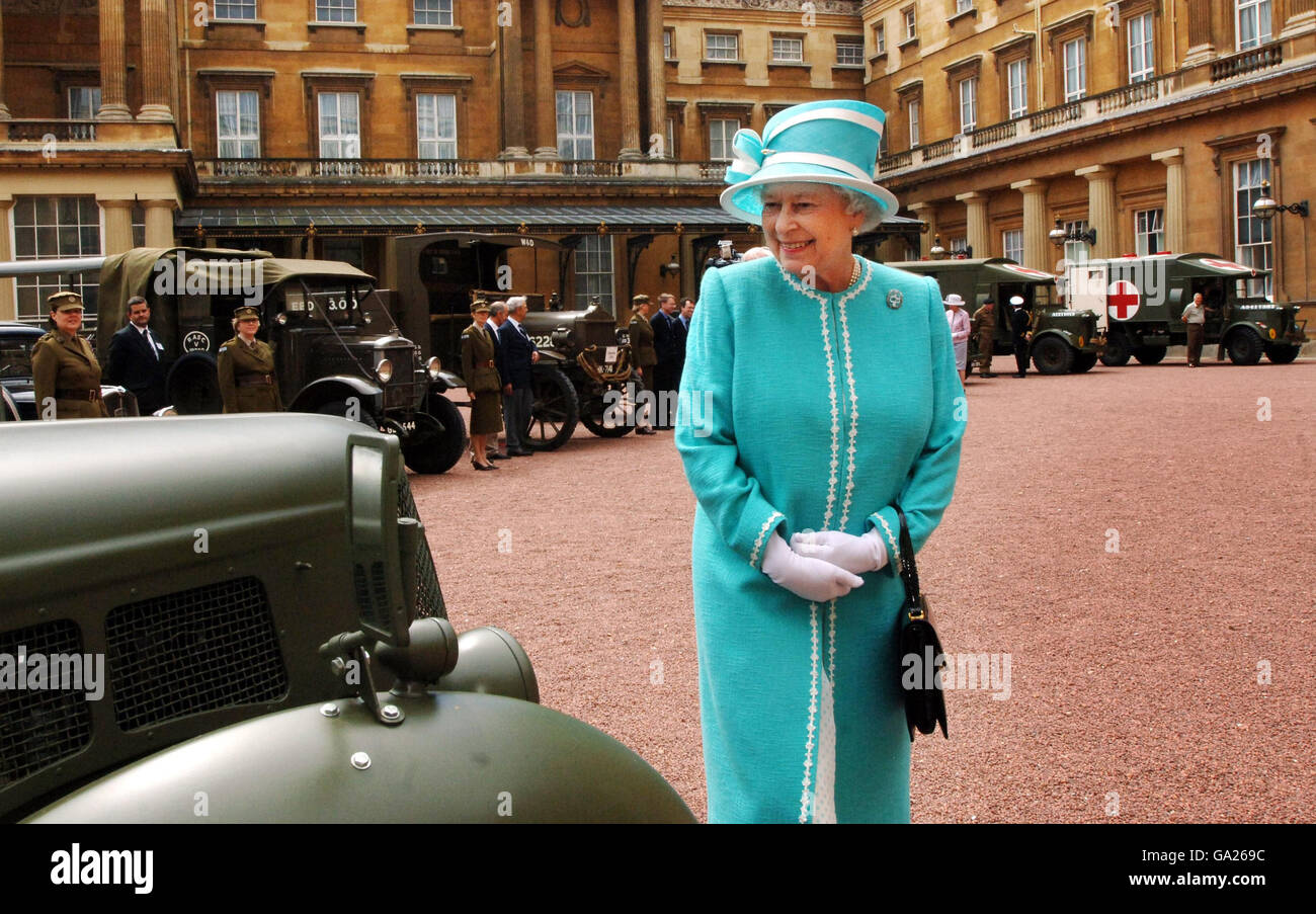 Queen Elizabeth II inspects vintage vehicles used by the First Aid ...