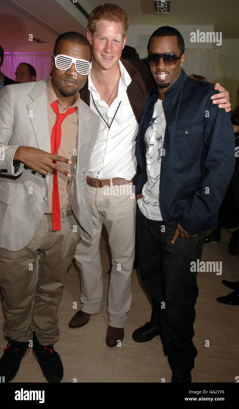 Britain's Prince Harry (centre) is seen with rappers Kanye West (left ...