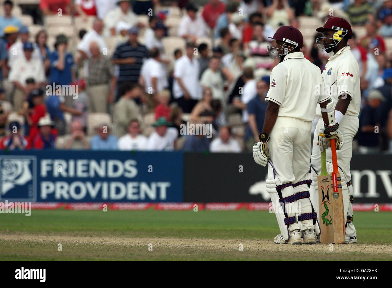West Indies' Shivnarine Chanderpaul (left) with teammate Corey ...