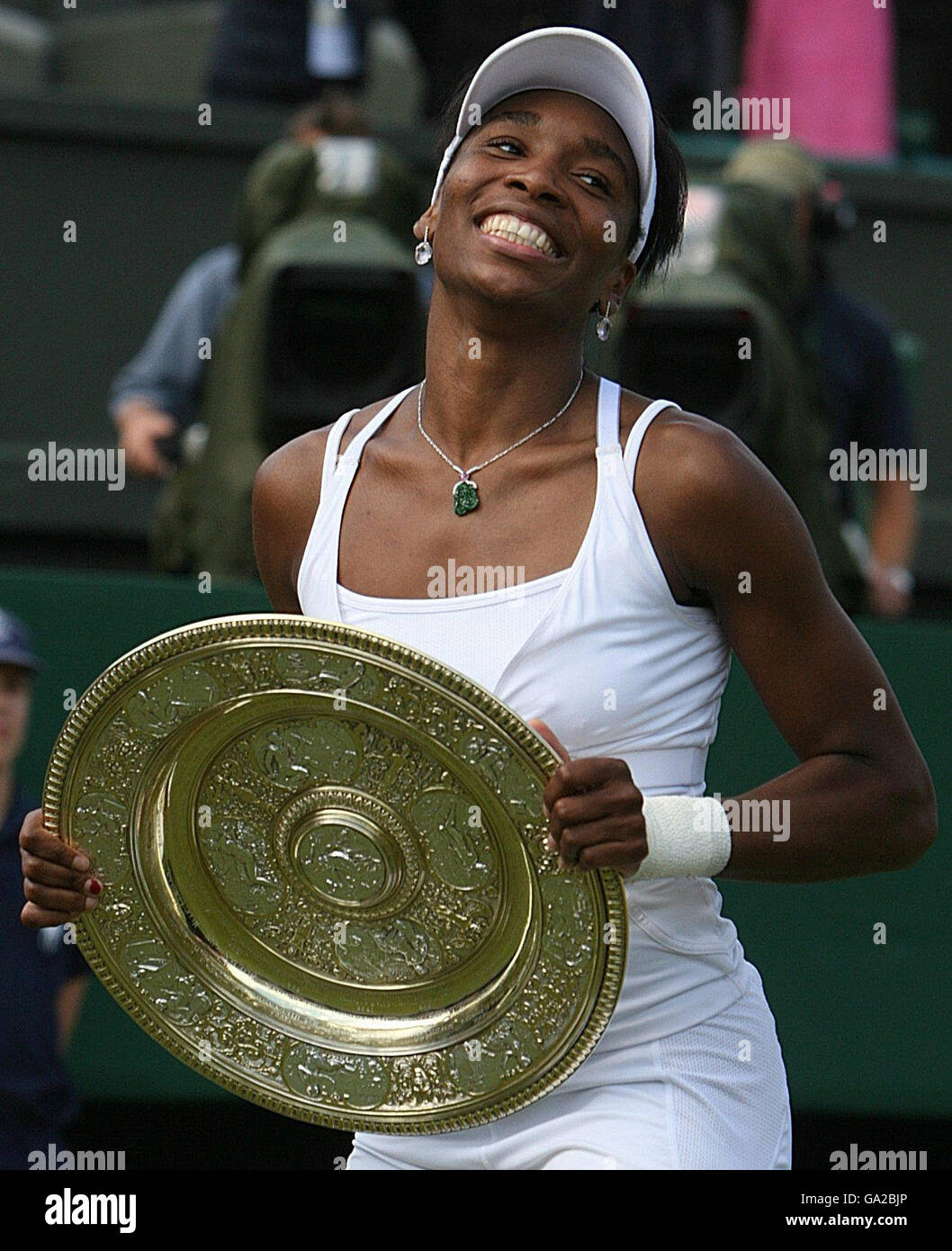 USA's Venus Williams celebrates with the trophy after winning the ...