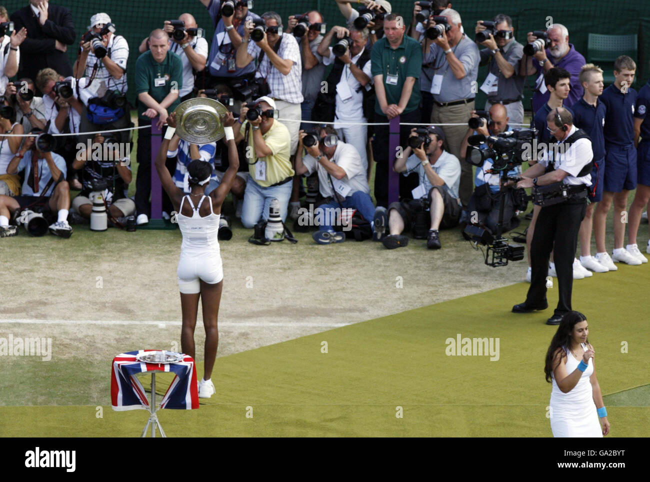 USA's Venus Williams celebrates with the trophy after winning the ...